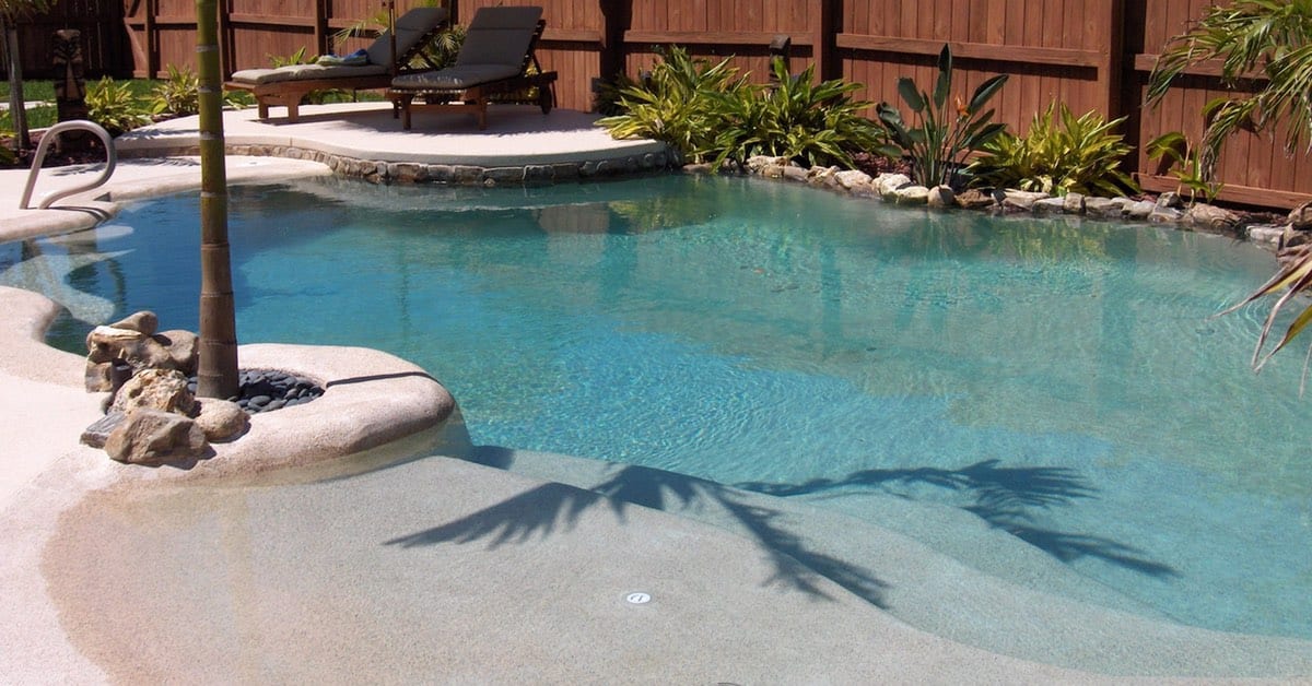Zero Entry Pools Look Like a Beach in Your Own Backyard | Pulliam Pools
